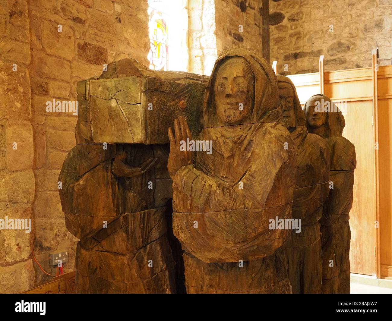 light shining through new coloured stained glass window depicting St ...