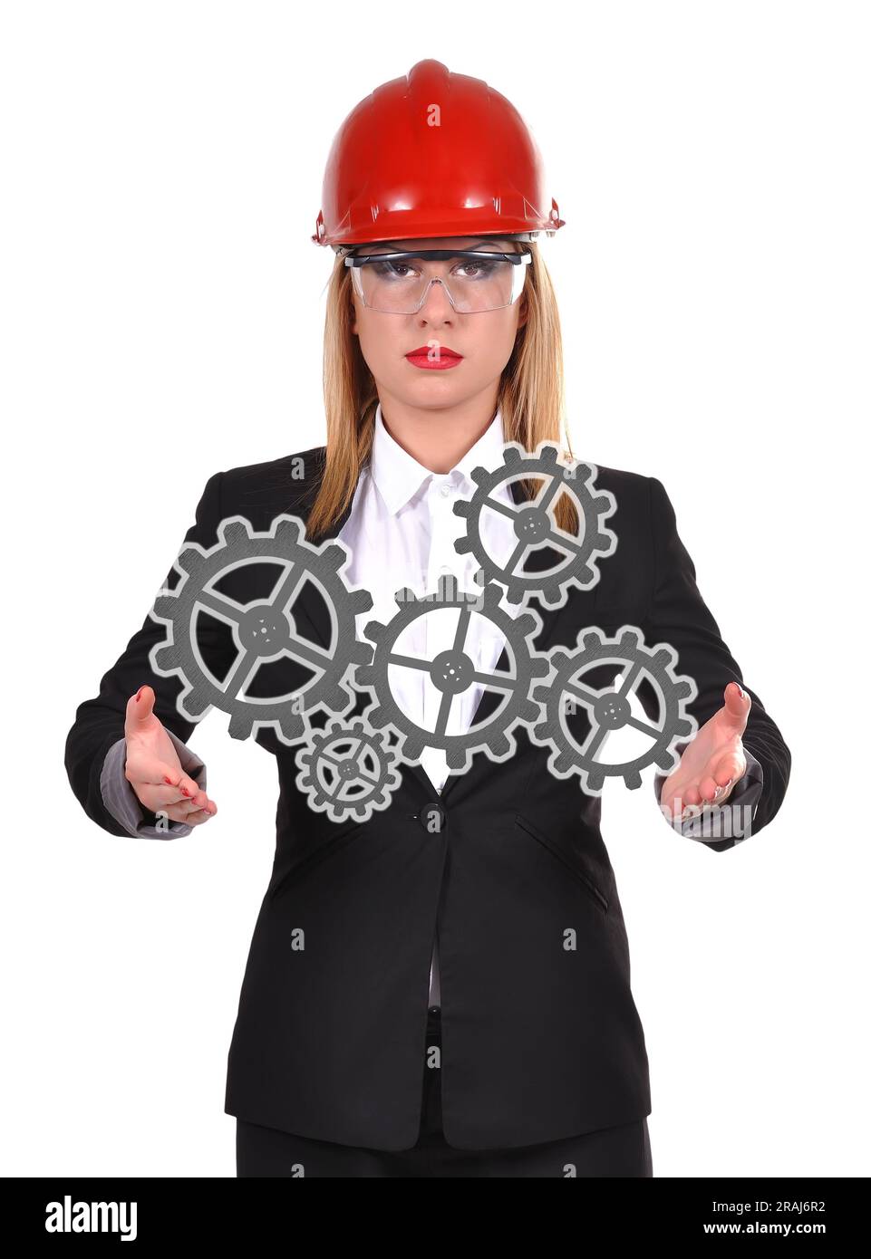 Engineer woman holding gears on a white background Stock Photo - Alamy