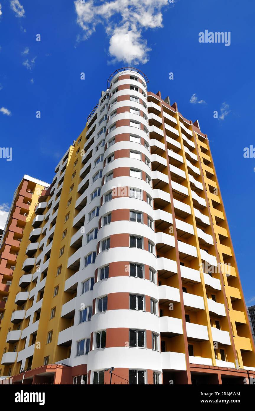 New multi-storey building on a sky background Stock Photo - Alamy