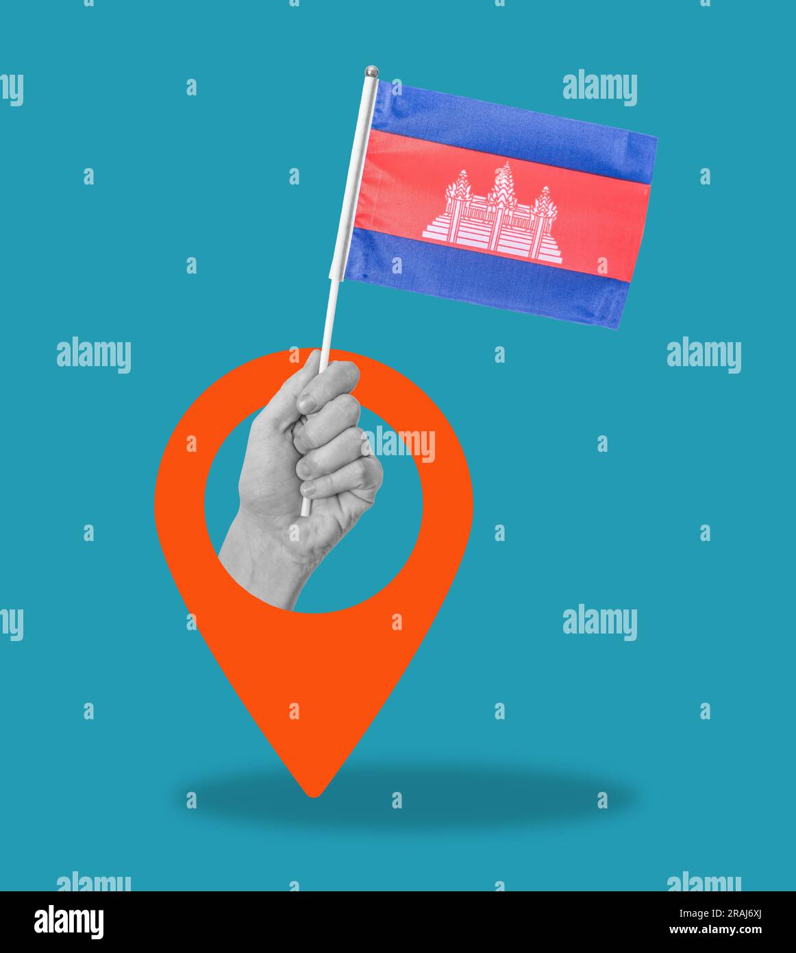 Art collage, the hand with the flag of Cambodia on a blue background ...