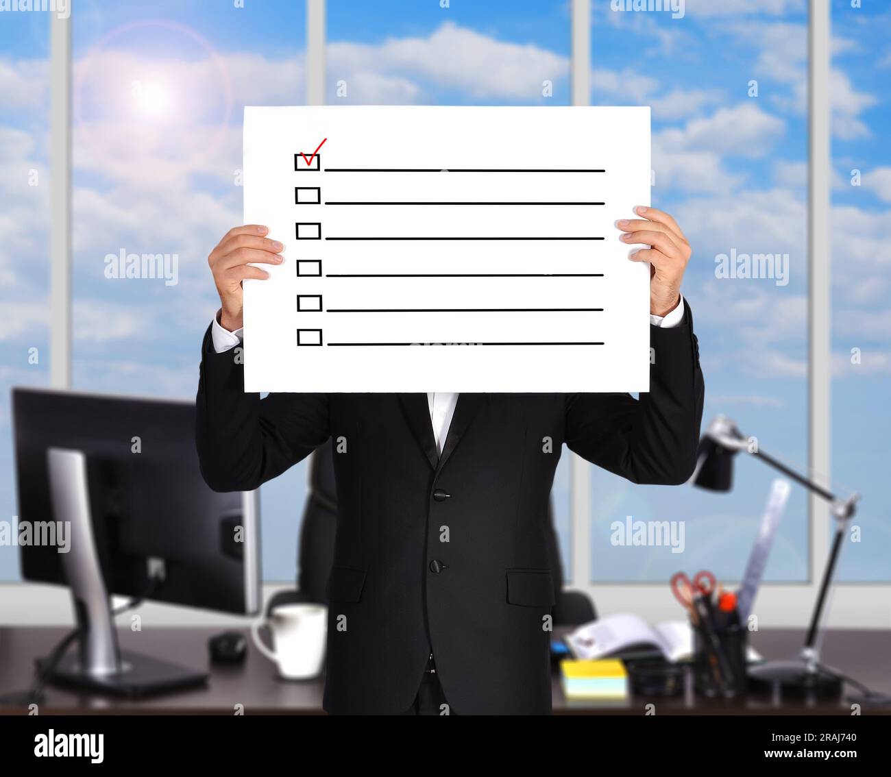 Office worker with checklist hi-res stock photography and images - Alamy