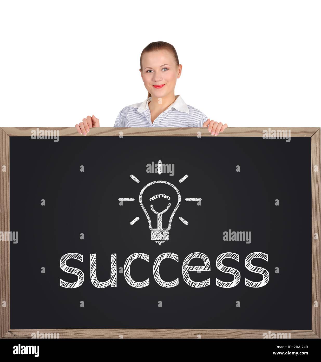 teacher holding big blackboard with success symbol Stock Photo - Alamy