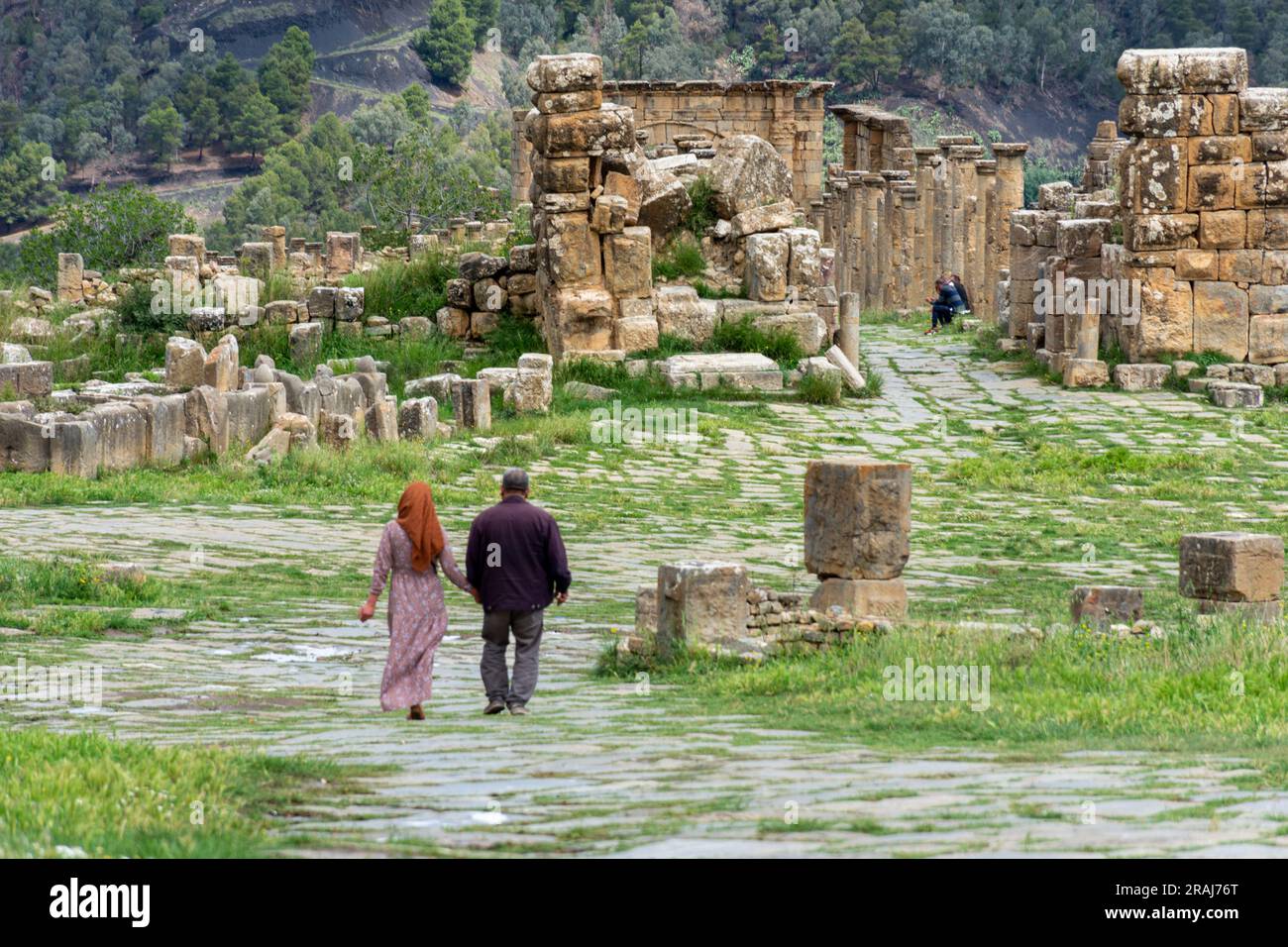 Algerian couple walking in the ancient Roman town of Cuicul. UNESCO ...
