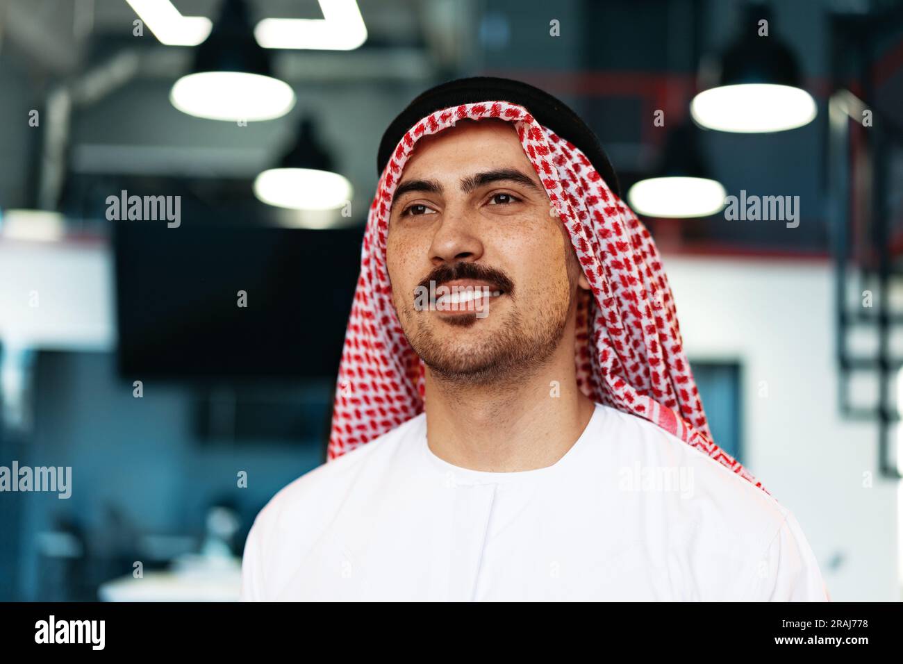 Successful muslim businessmen in traditional outfit in his office Stock ...