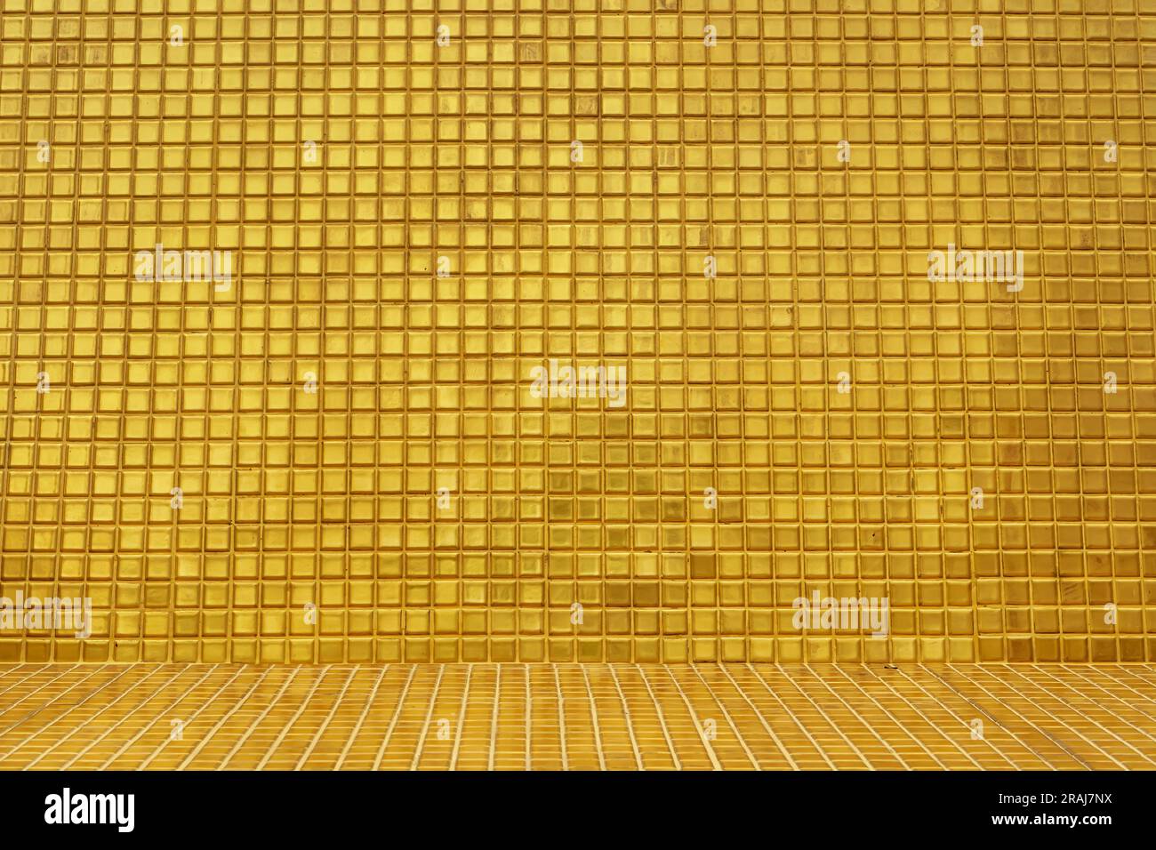 Wall and floors with gold tiles, It is commonly used in temples and ...