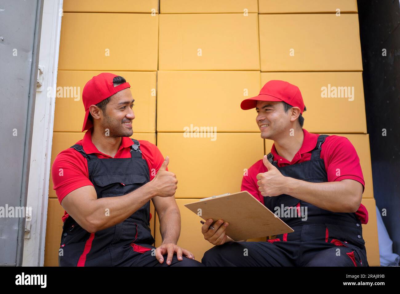 Delivery man move items to the house. Service and delivery concept ...