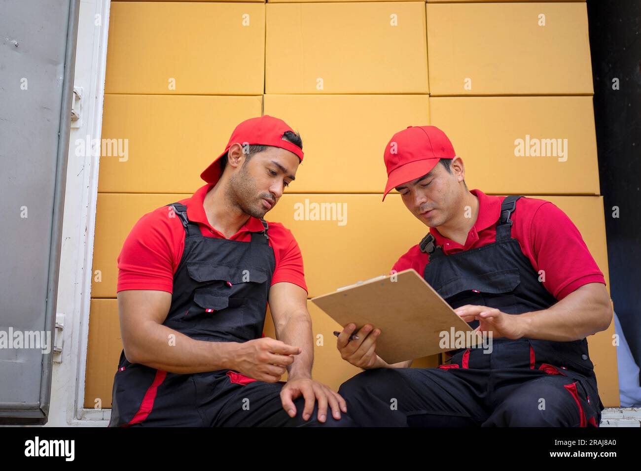 Delivery man move items to the house. Service and delivery concept ...