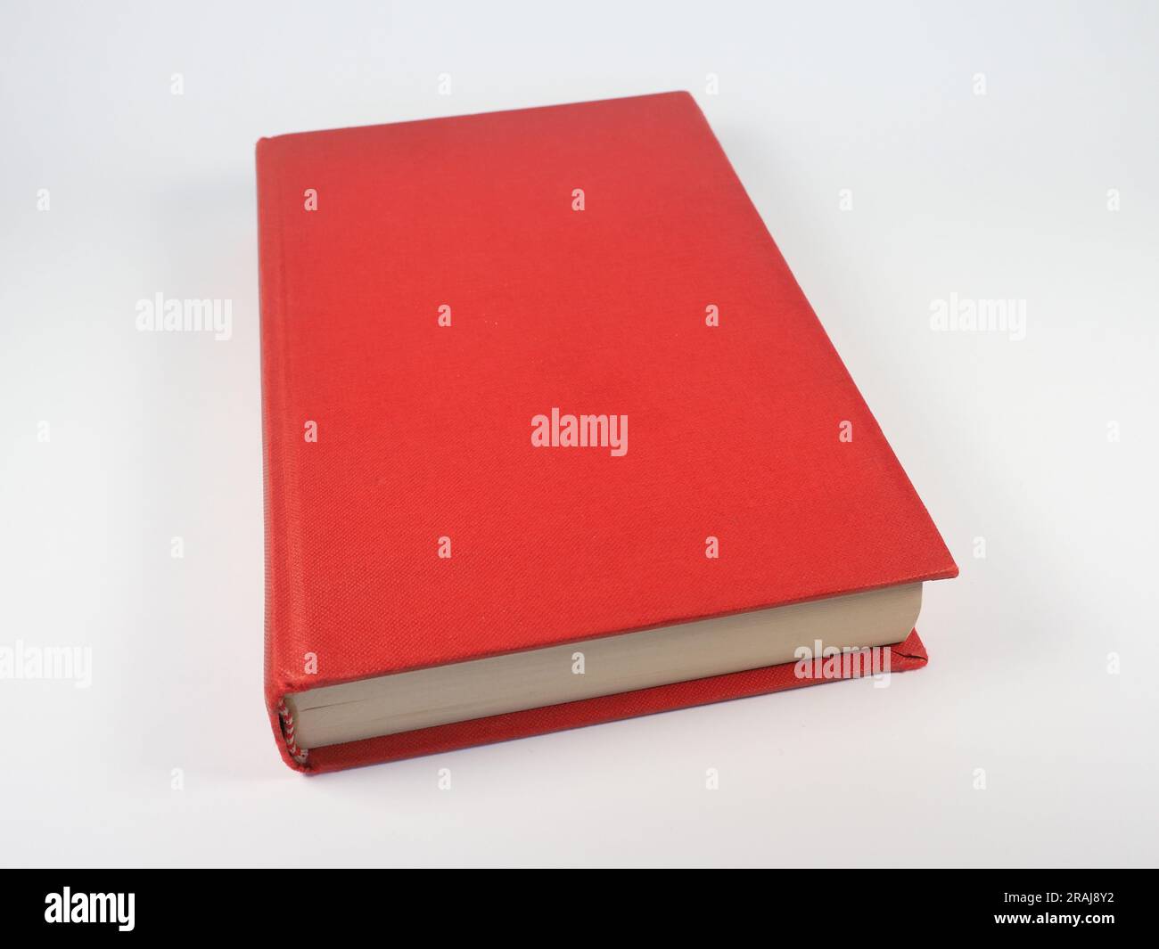 closed red book over off white background with copy space Stock Photo ...