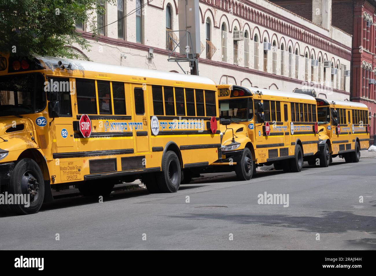 School buses parked in school hi-res stock photography and images - Alamy