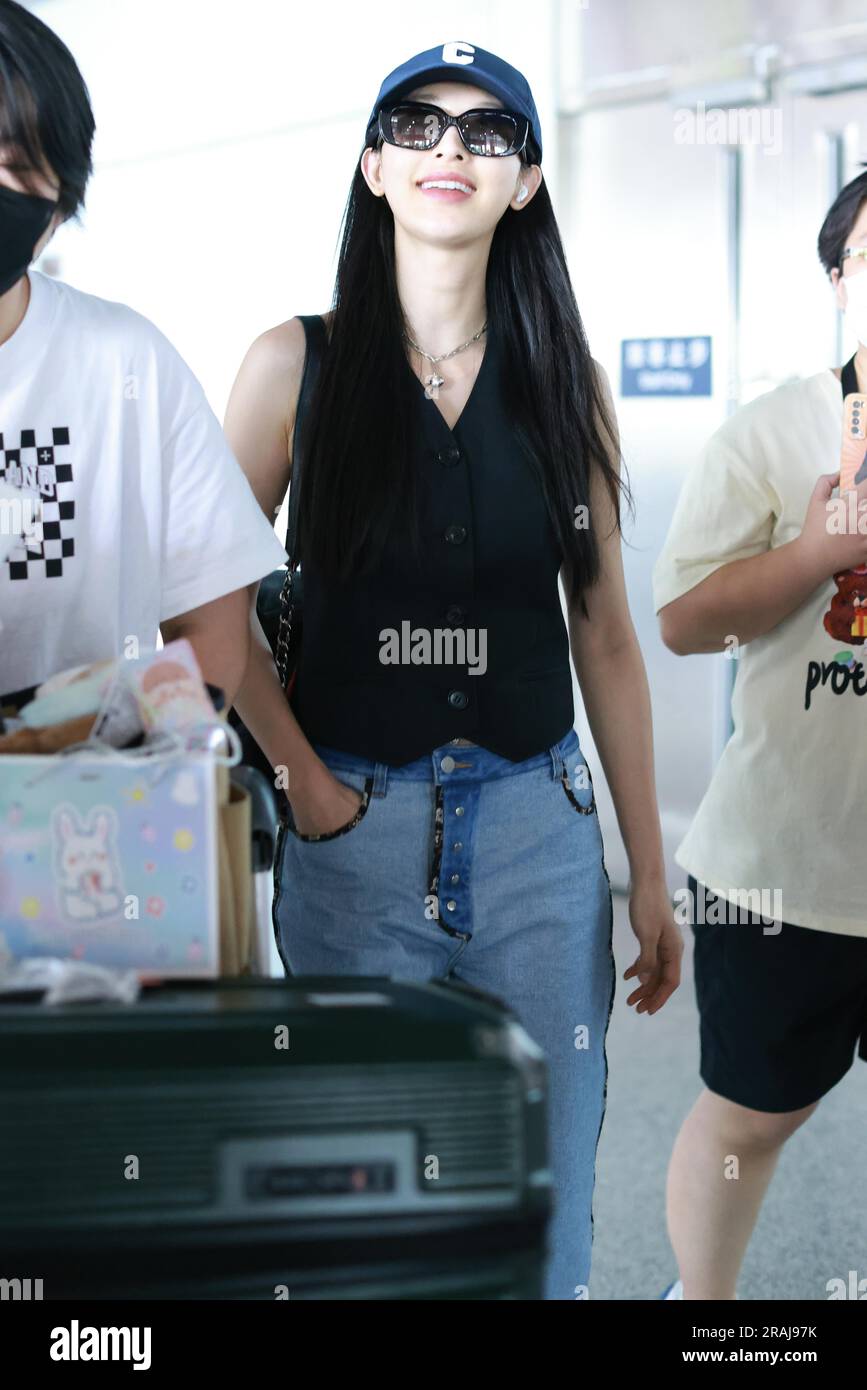 Chinese actress Zhang Li appears at airport in Beijing, China, 1 July ...
