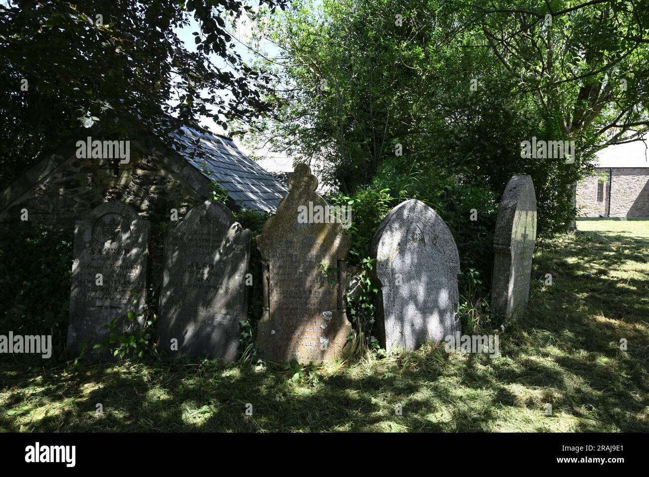 ST NEWLYN EAST CHURCH AND GRAVE YARD WITH HEADSTONES AND PATH LINE WITH ...