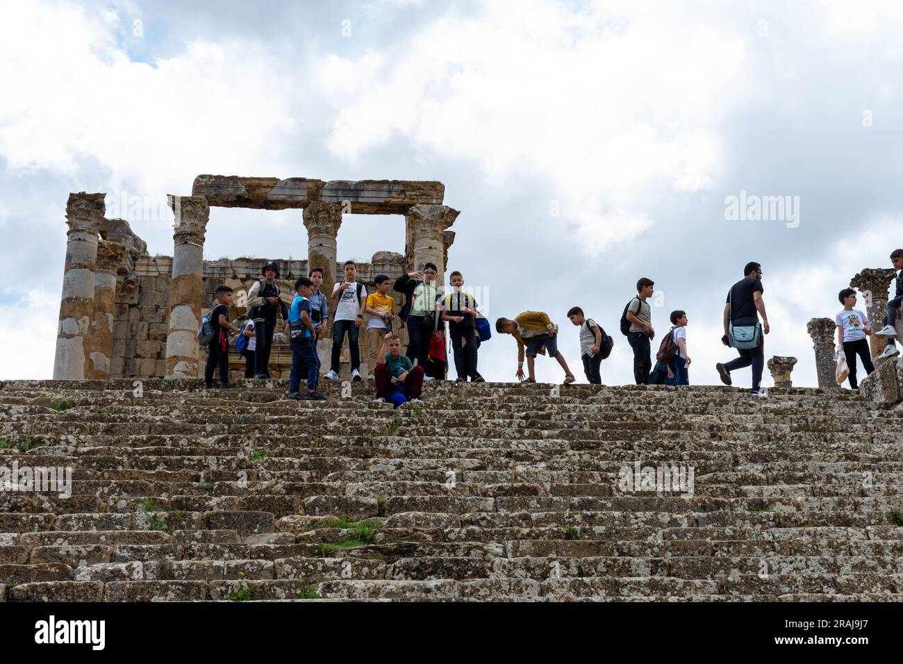 School children in tour in the ancient Roman town of Cuicul in Djemila ...