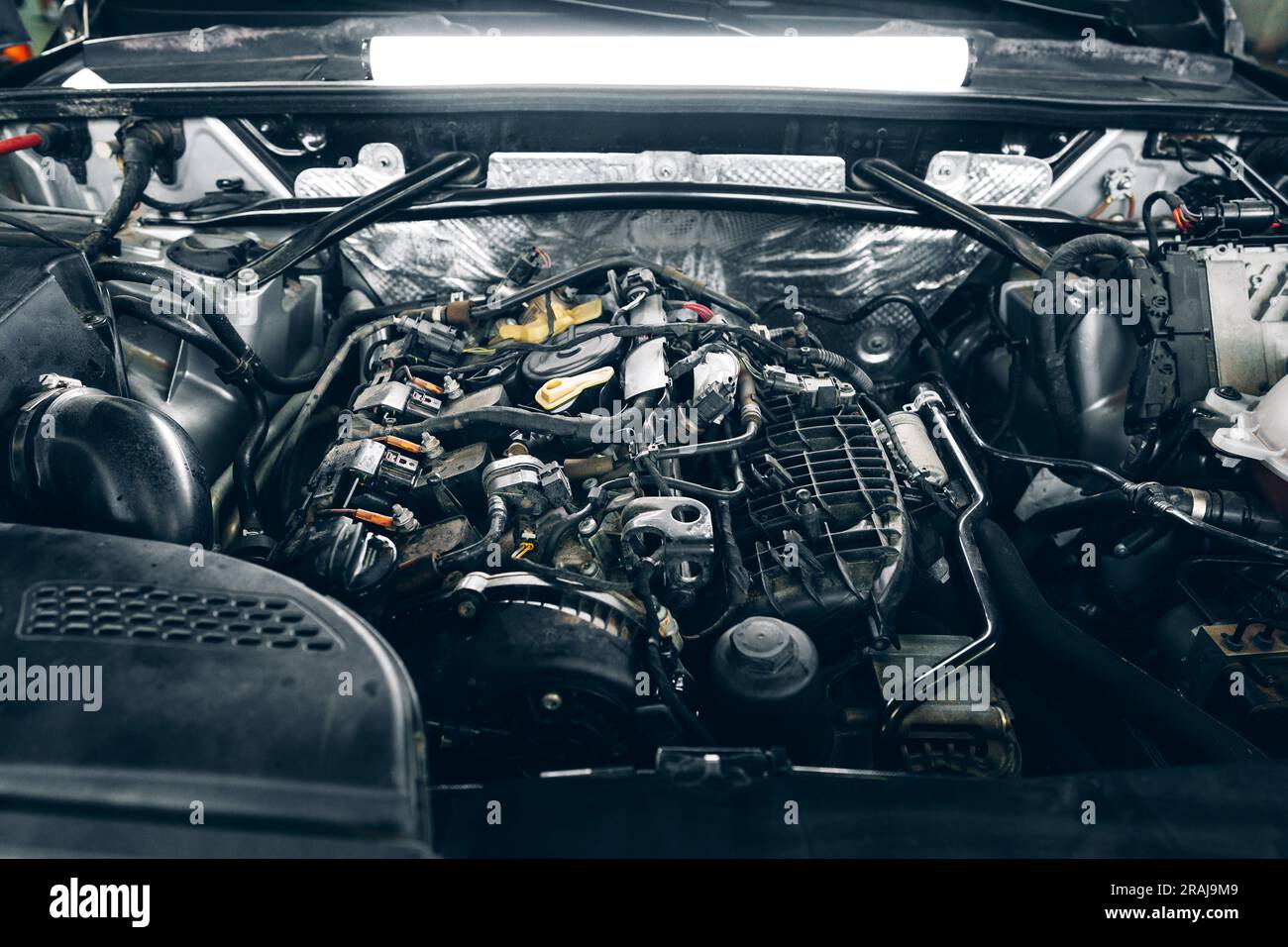 Close up of powerful car engine under the hood Stock Photo - Alamy