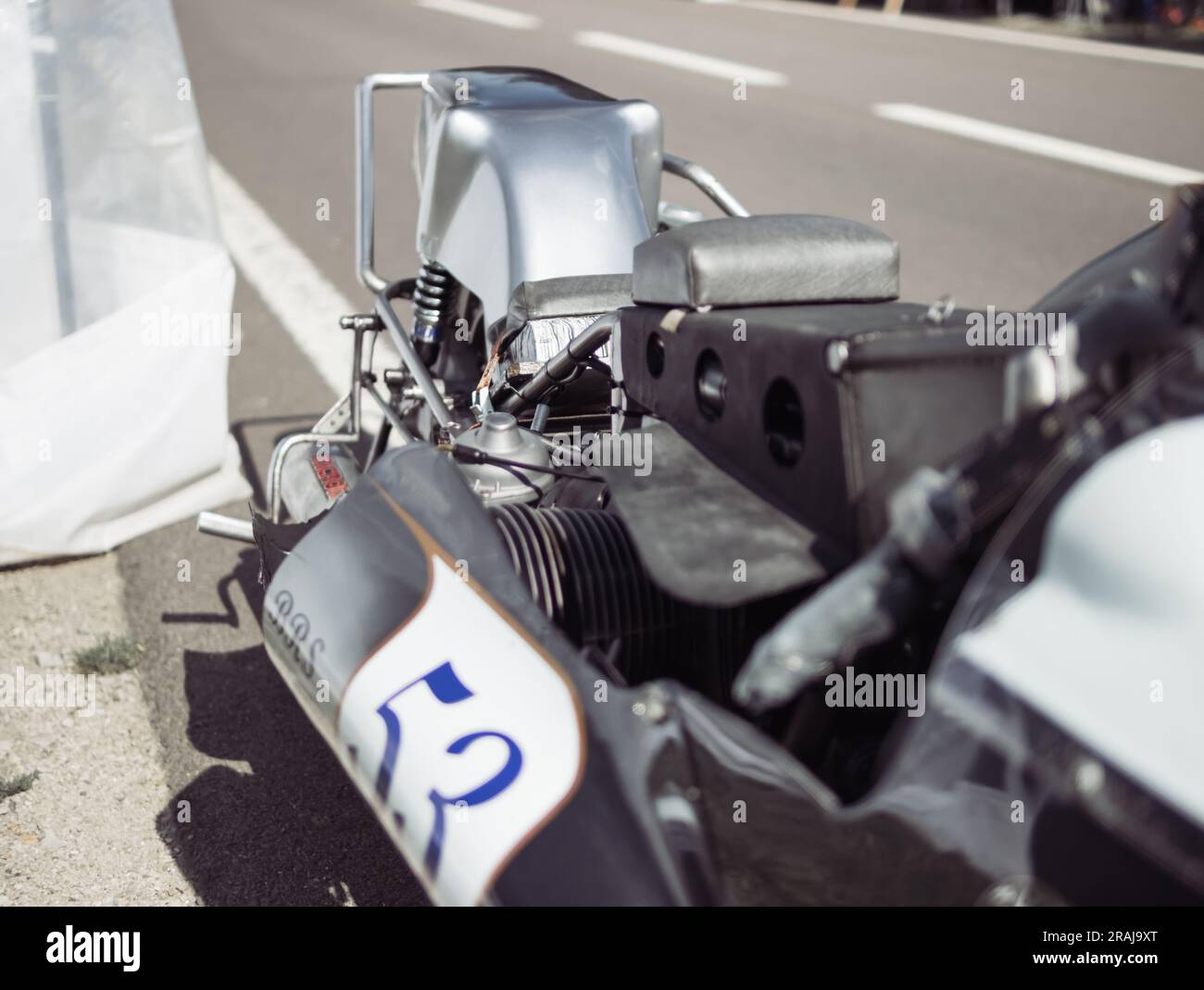 close-up of a motor on a rare racing car,black gray car with racing ...