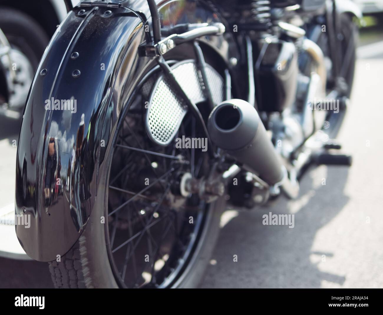motorcycle rear wheel close-up, isolated motorcycle wheel on the street ...