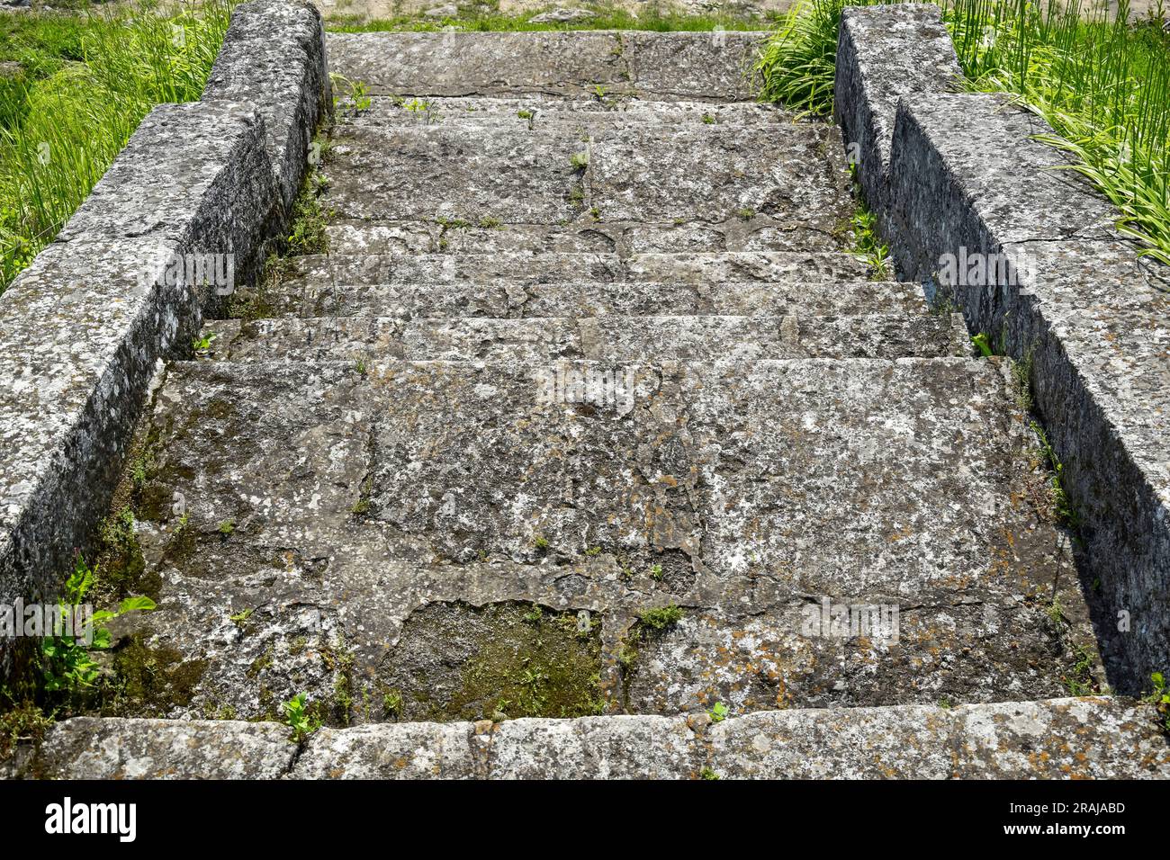 Picturesque view of stone steps of stairs in park. Old stone staircase ...