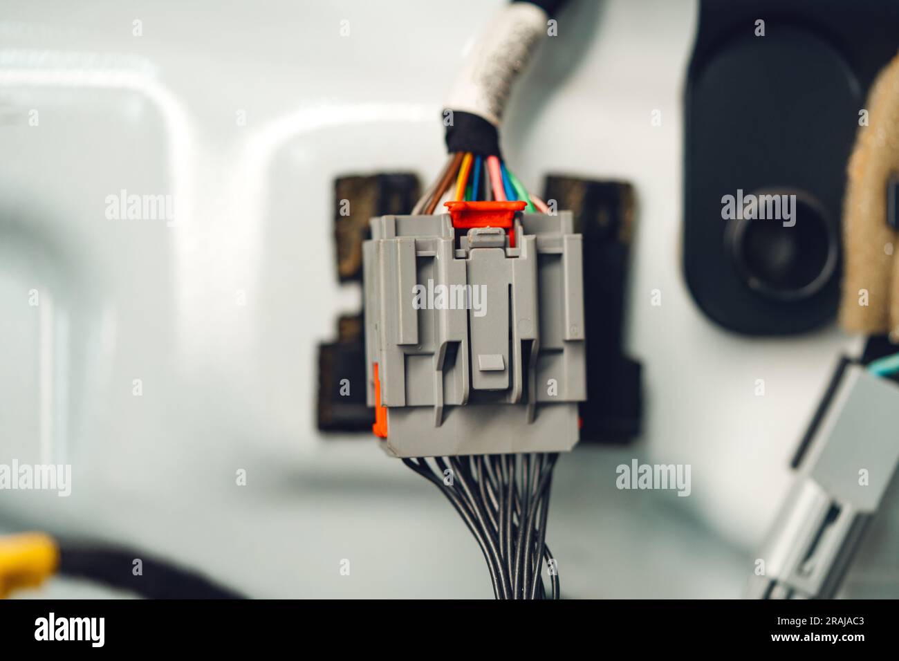 Electric wiring system with colorful wires in the car Stock Photo - Alamy