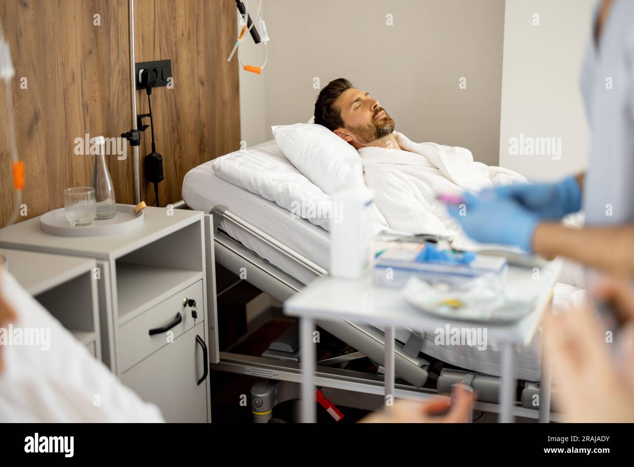 Male resting in medical ward Stock Photo - Alamy