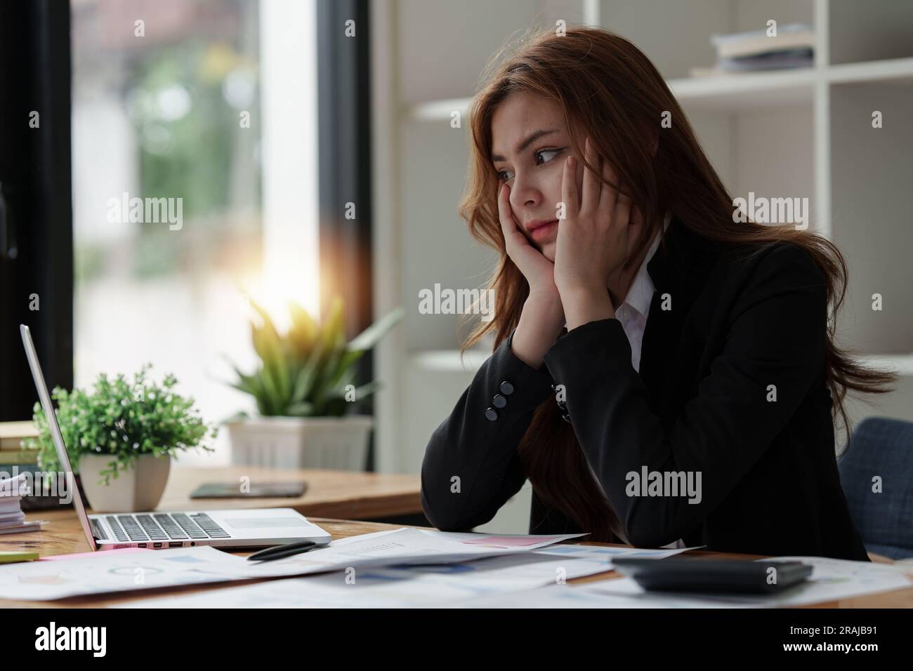 Stressed and Burnout. Business woman worry about her work at office ...