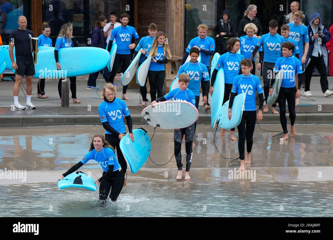 Welsh surfing champion and Wave Surf Coach, Emily Williams, (left ...
