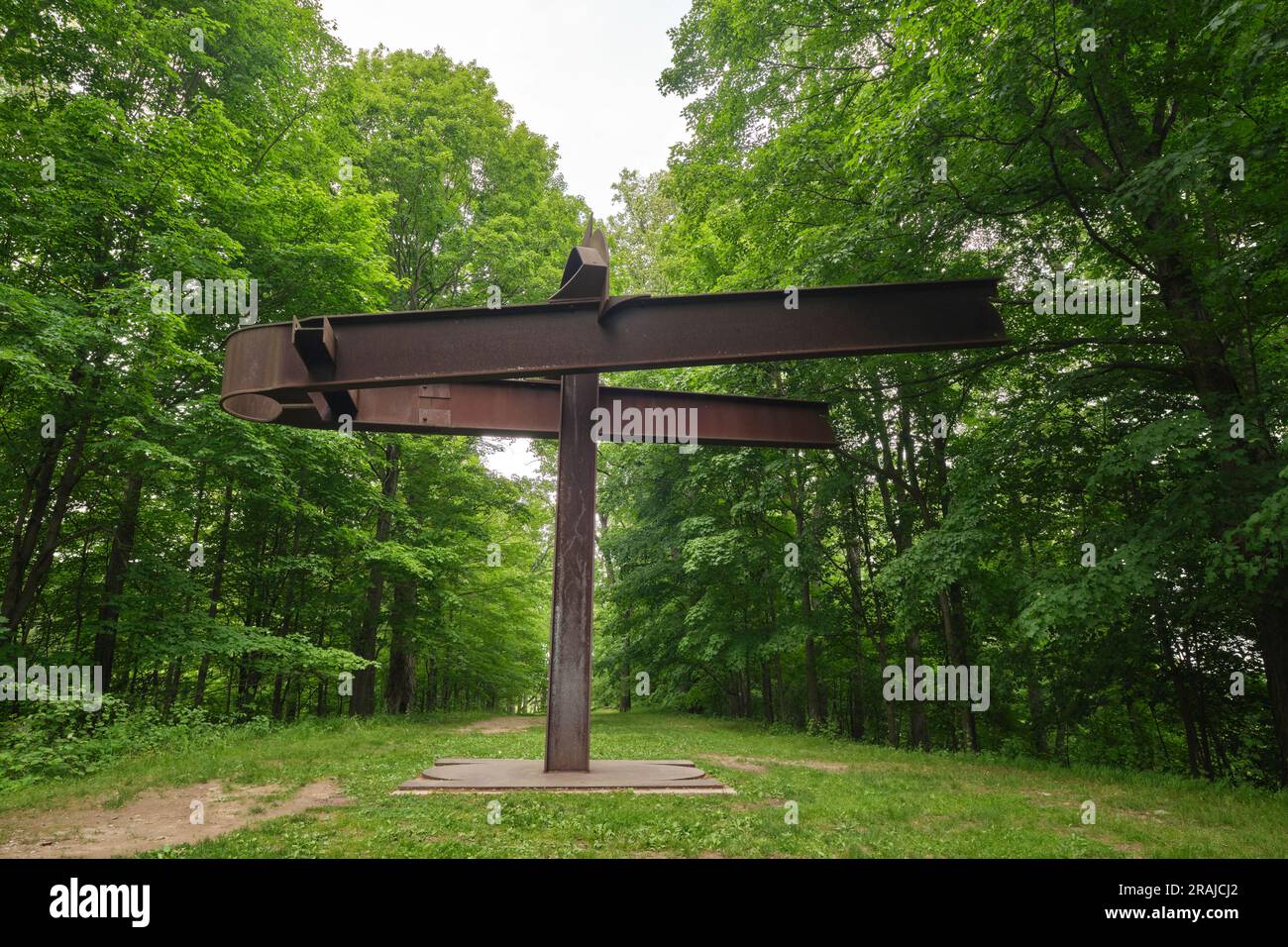 A rusty, I beam column sculpture titled Mahatma, by Mark di Suvero. At ...