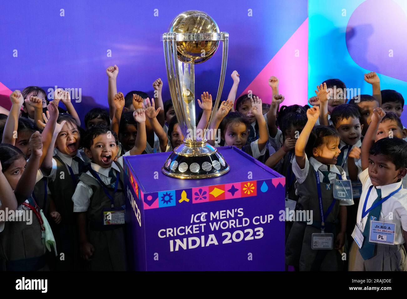 School children shout slogans standing beside the International Cricket ...