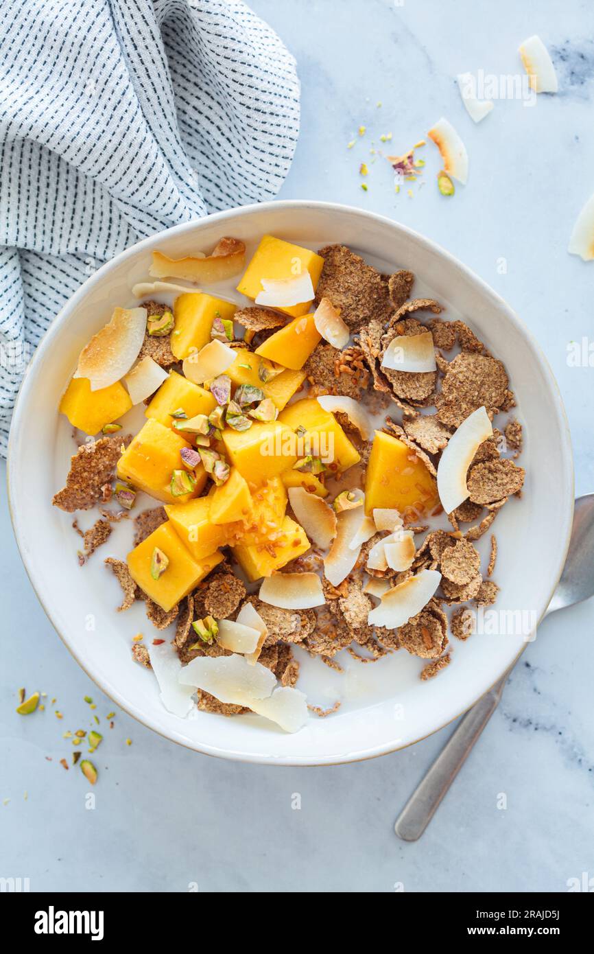 Multigrain wholewheat breakfast cereals with banana, coconut and mango ...