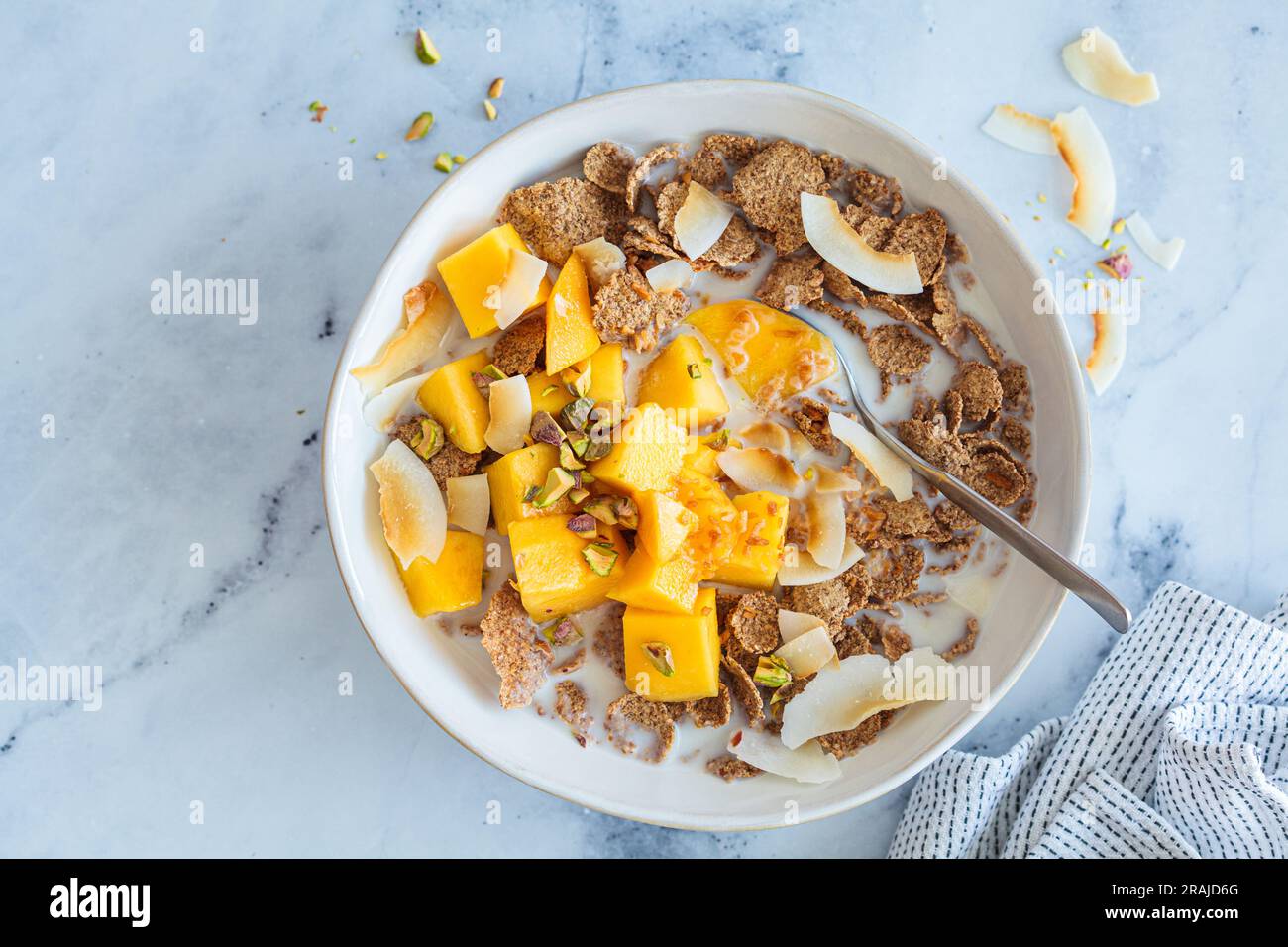 Multigrain wholewheat breakfast cereals with banana, coconut and mango ...