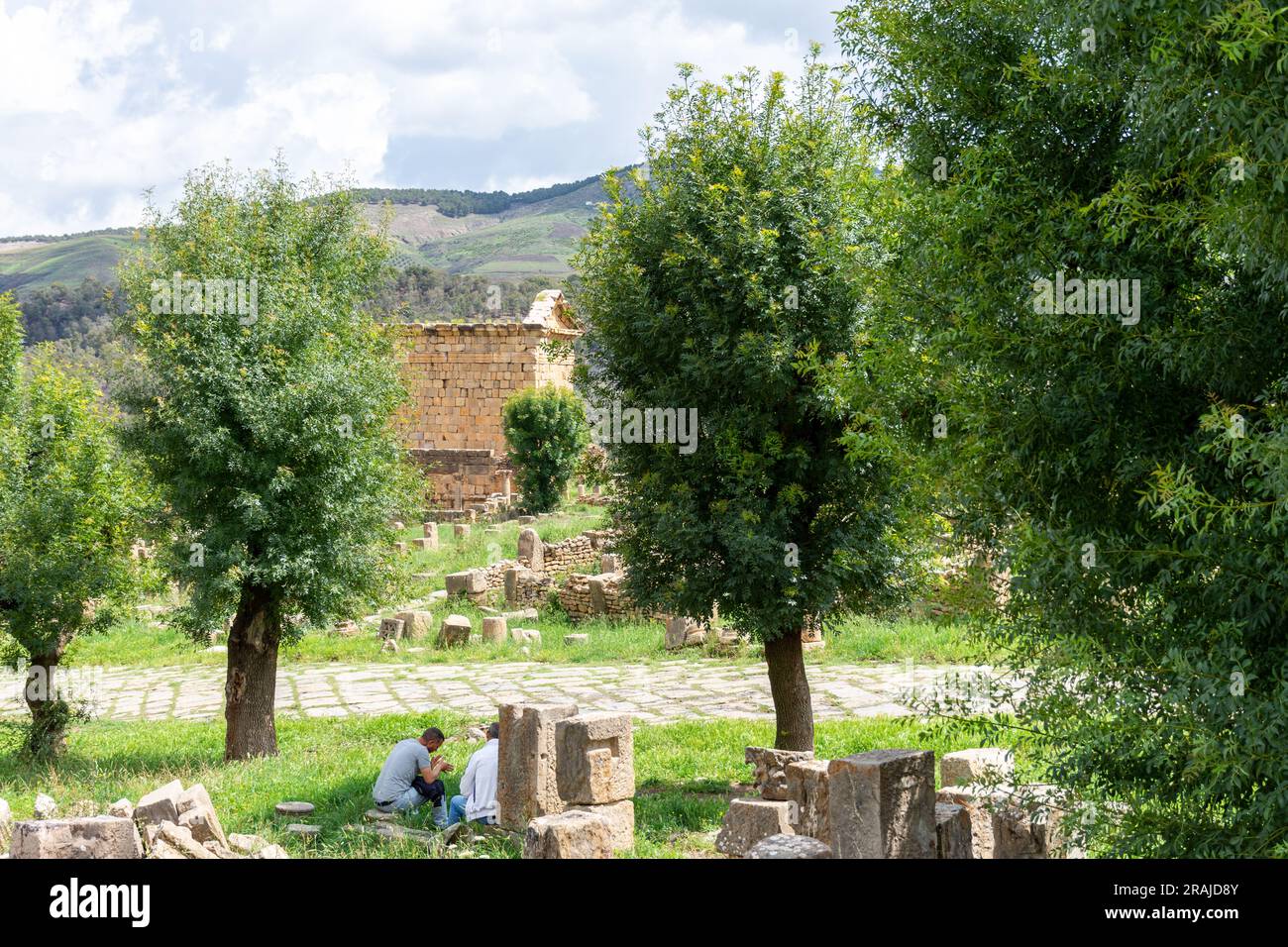Tourists walking in the ancient Roman town of Cuicul. UNESCO world ...