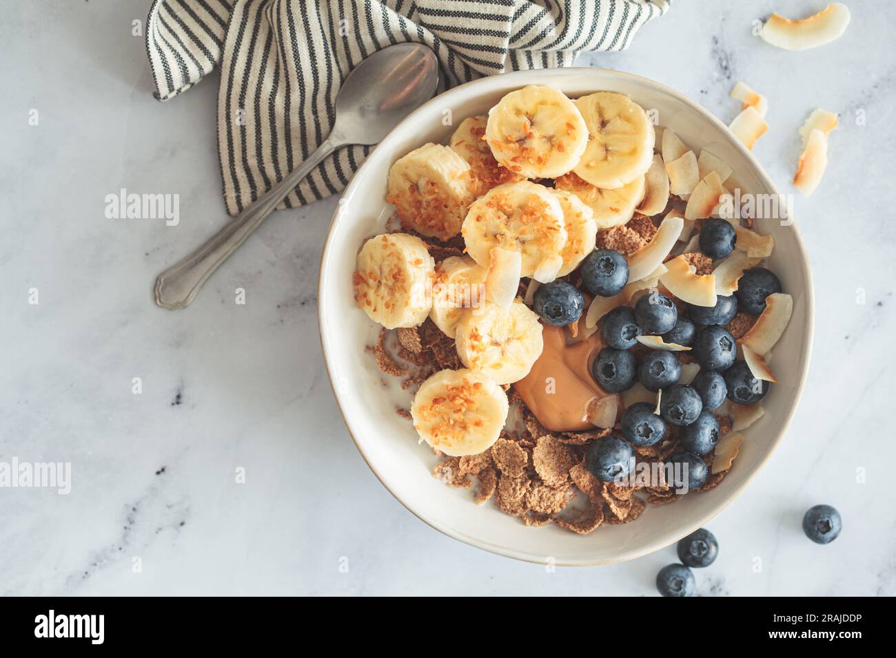 Multigrain wholewheat breakfast cereals with banana, coconut and ...