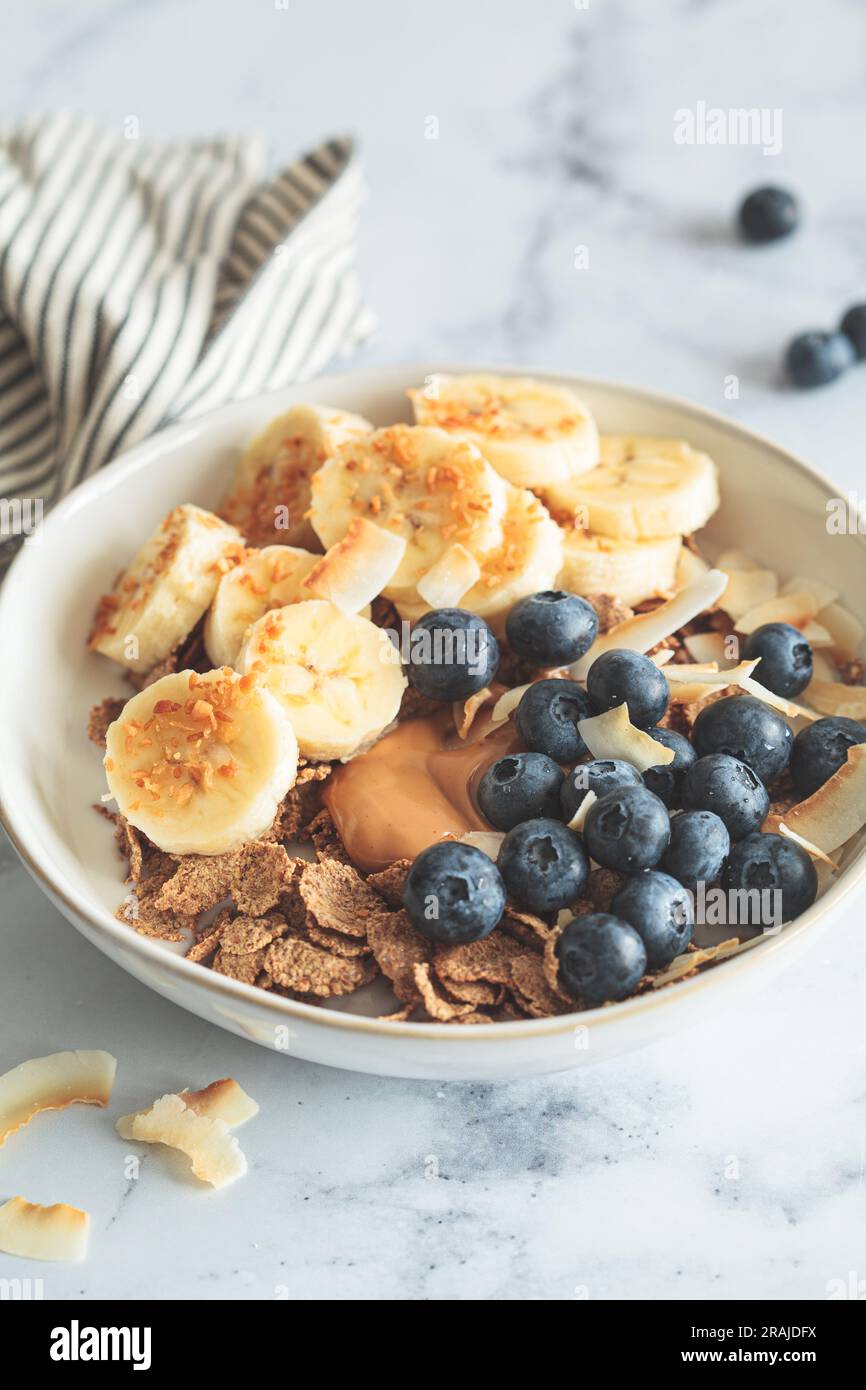 Multigrain wholewheat breakfast cereals with banana, coconut and ...