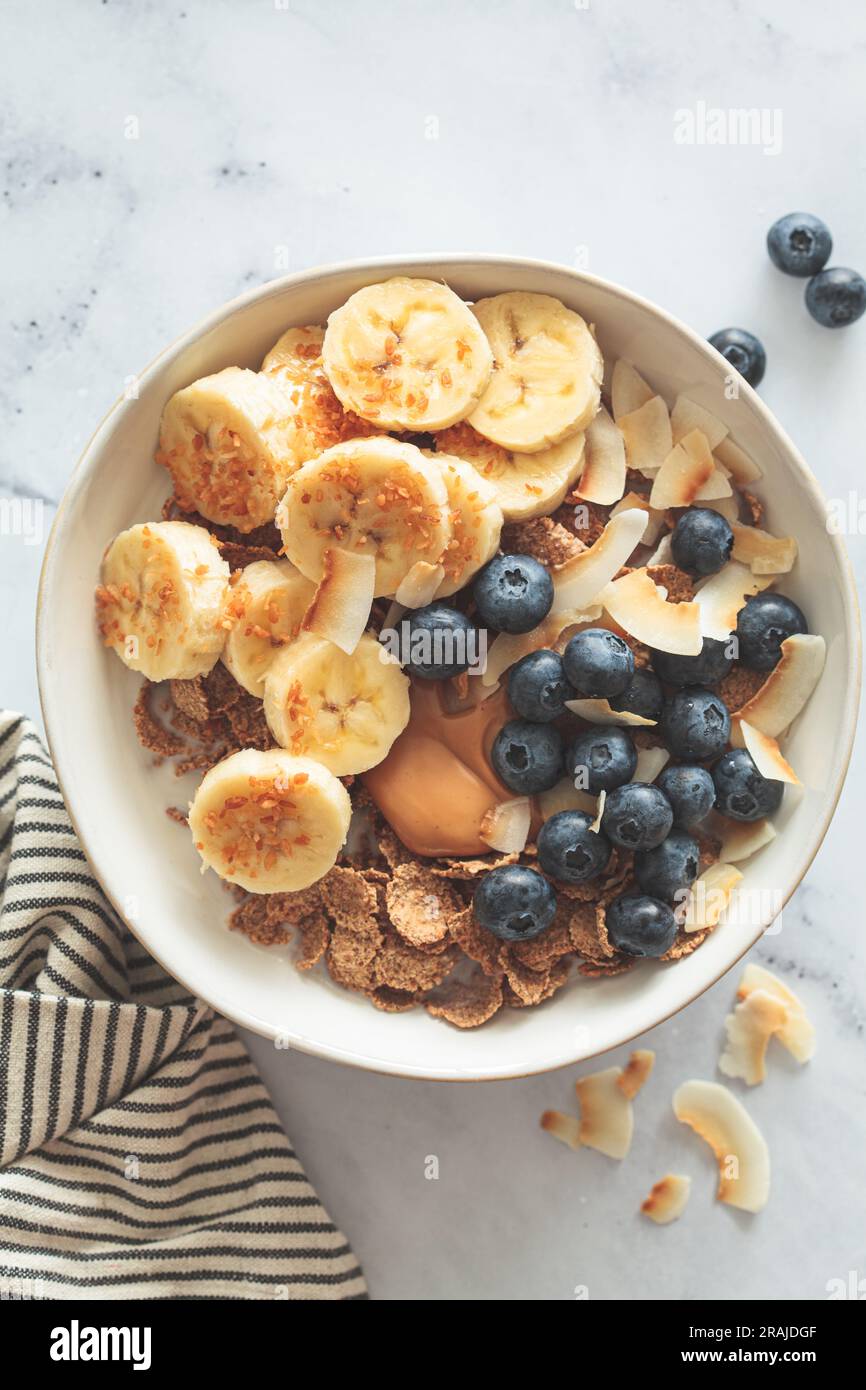 Multigrain wholewheat breakfast cereals with banana, coconut and ...