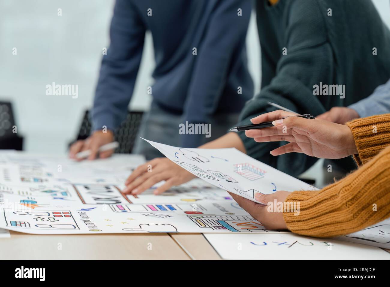 Creative designer choosing color samples for mobile responsive website ...