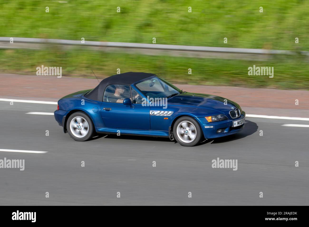 BMW Z4 convertible; travelling at speed on the M6 motorway in Greater ...