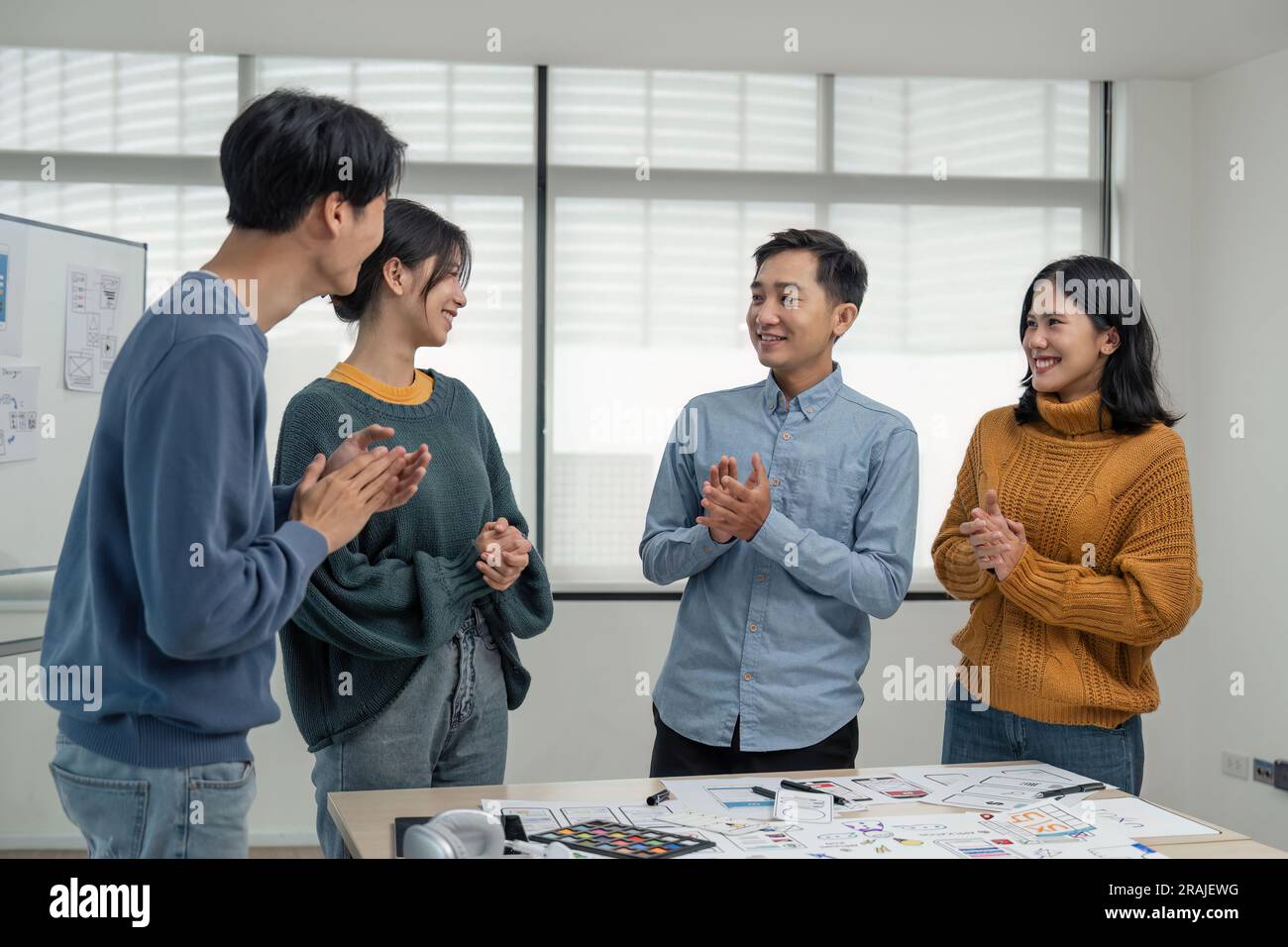 Successful Web developer team. Group of young modern people in casual ...