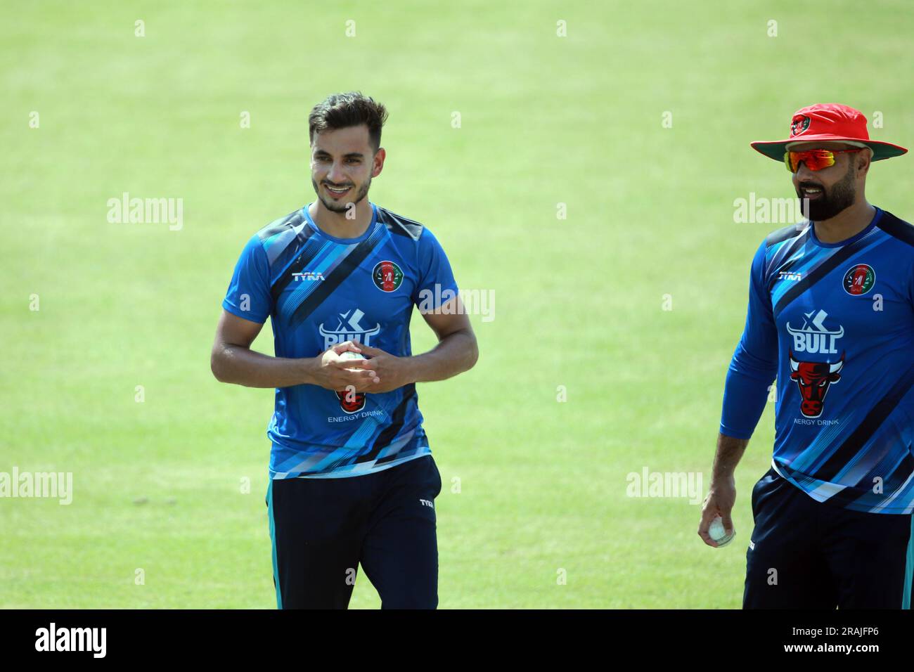 Afghanistan Cricketer Izharulhaq Naveed (L) and Mohammad Nabi (R ...