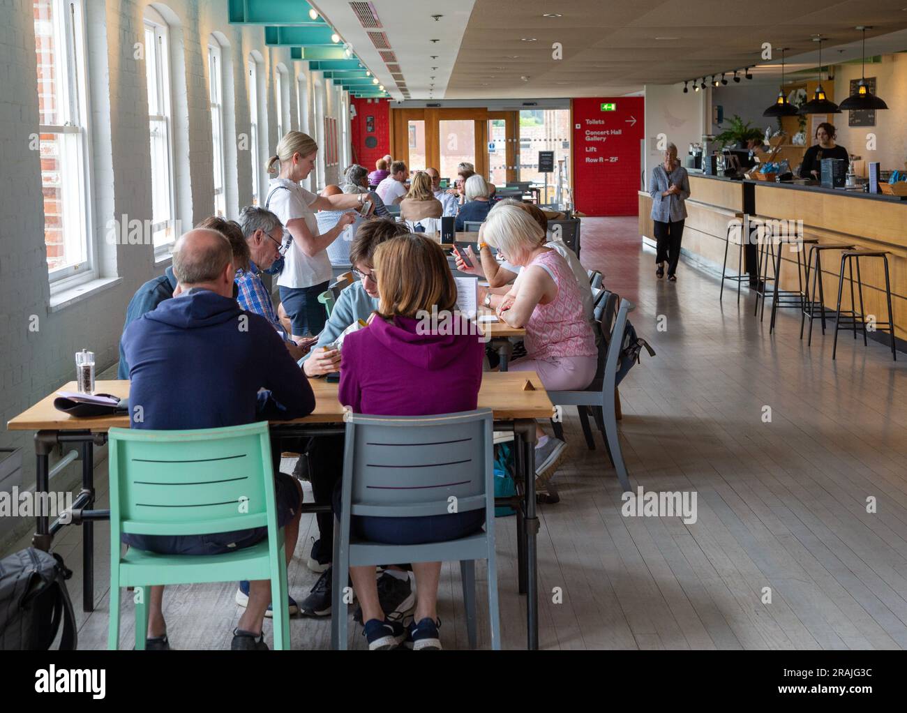 Customers sitting at cafe tables River View cafe bar, Snape Maltings ...
