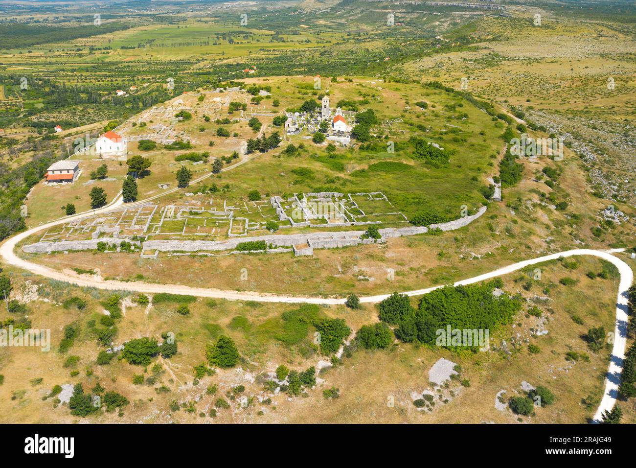 Aerial view of ancient Varvaria historic site on the hill, Dalmatia ...