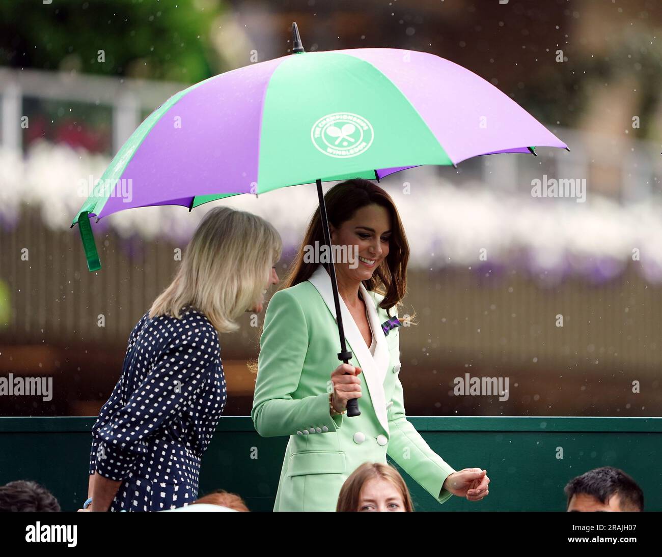 The Princess of Wales leaves court under an umbrella with Deborah ...