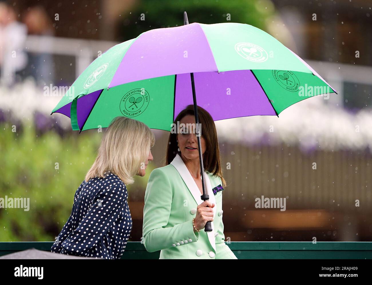 The Princess of Wales leaves court under an umbrella with Deborah ...