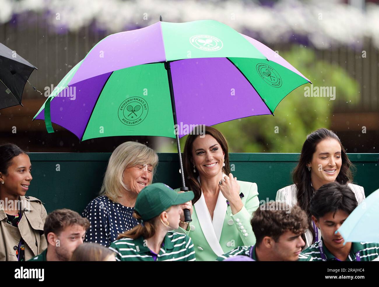 The Princess of Wales under an umbrella with Deborah Jevans before rain ...