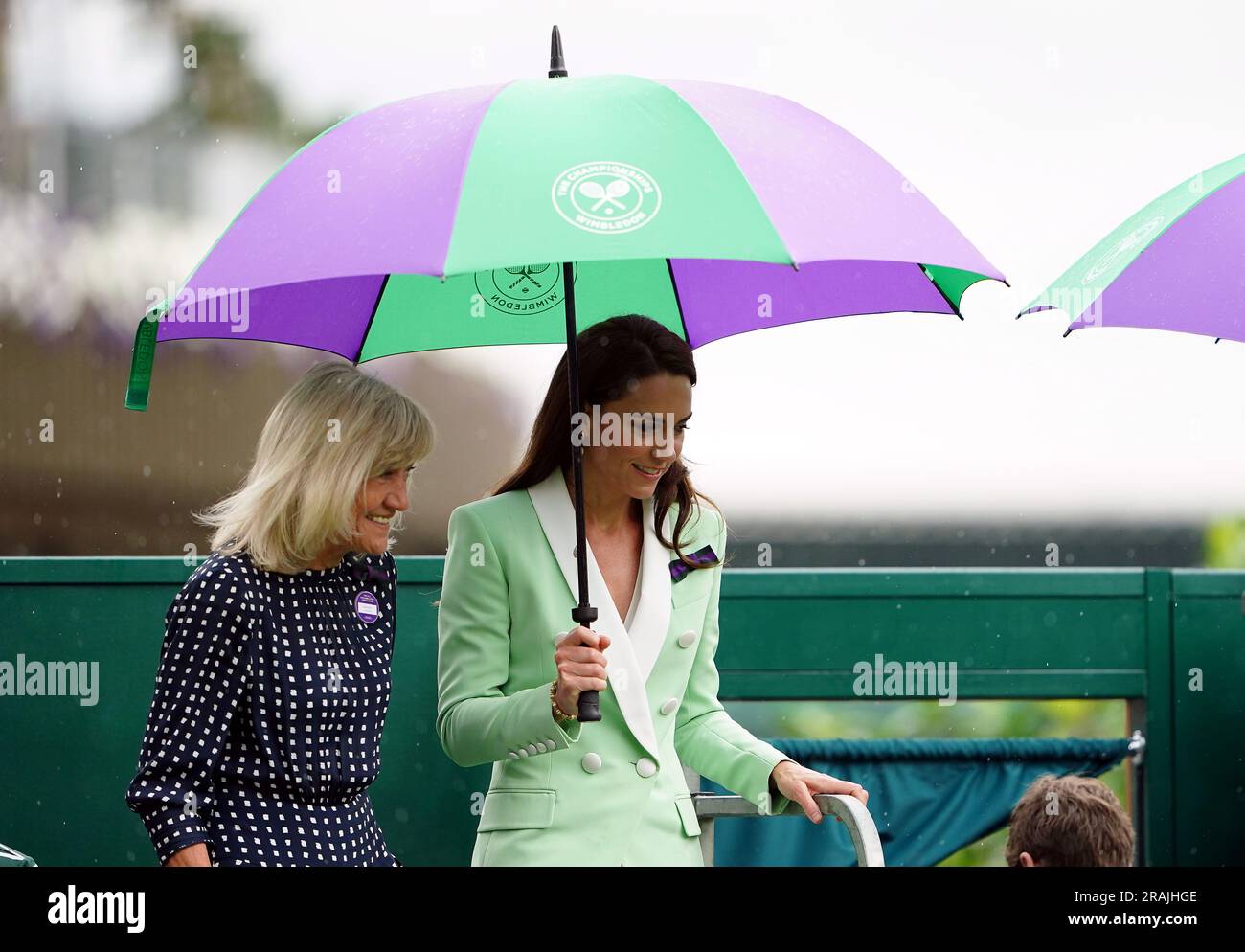 The Princess of Wales leaves court under an umbrella with Deborah ...