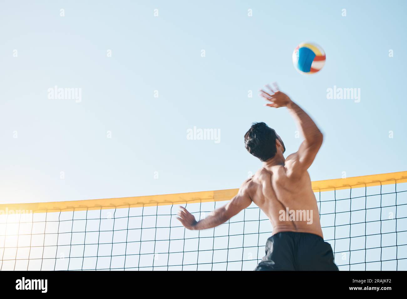 Volleyball, man and spiking, net with sports and fitness outdoor ...