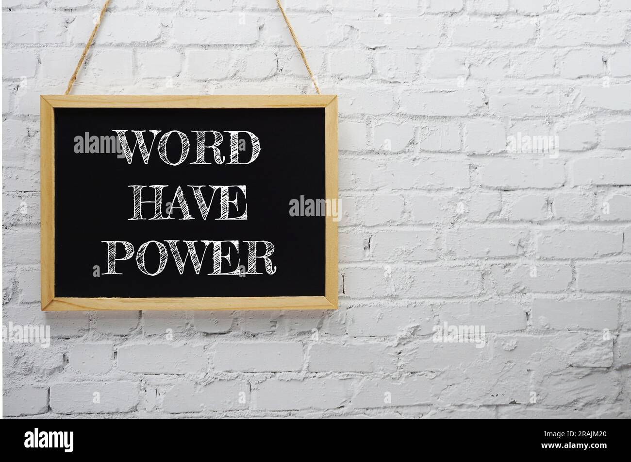 Word Have Power typography text on wooden blackboard hanging on white ...