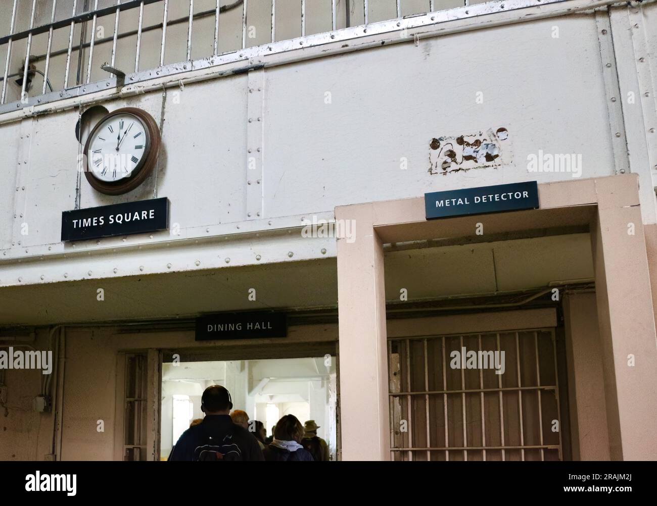 San Francisco Clock over the Times Square sign next to a metal detector ...