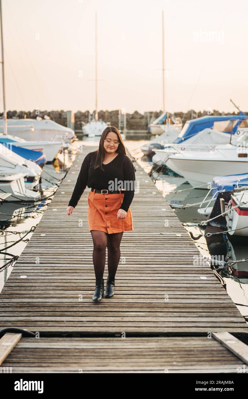 Outdoor portrait of asian plus size model posing by the lake Stock ...