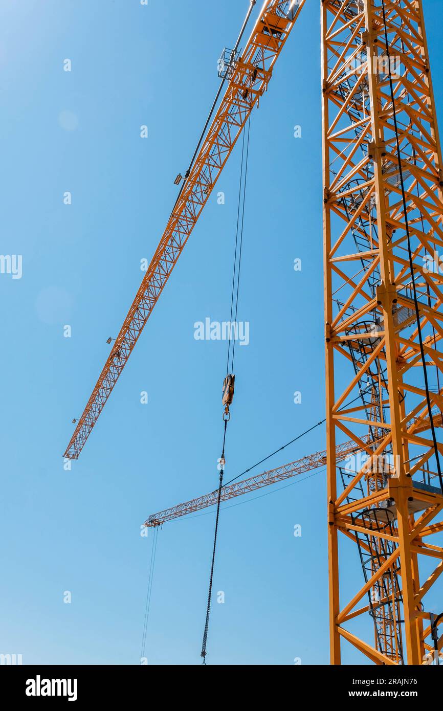 Tall yellow crane hi-res stock photography and images - Alamy