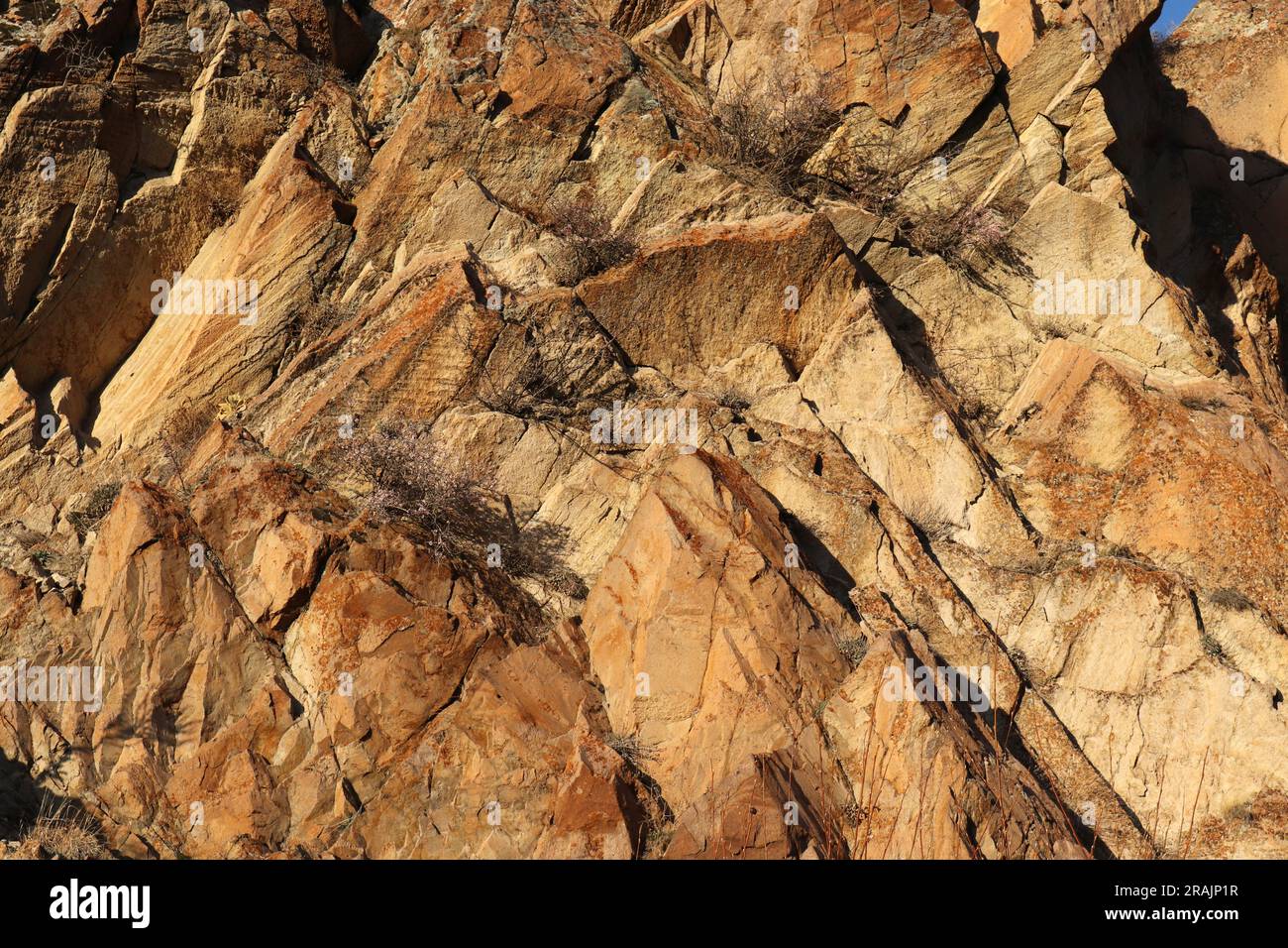 Layered rocks and hills. Surface of a natural stone brown colour Stock ...