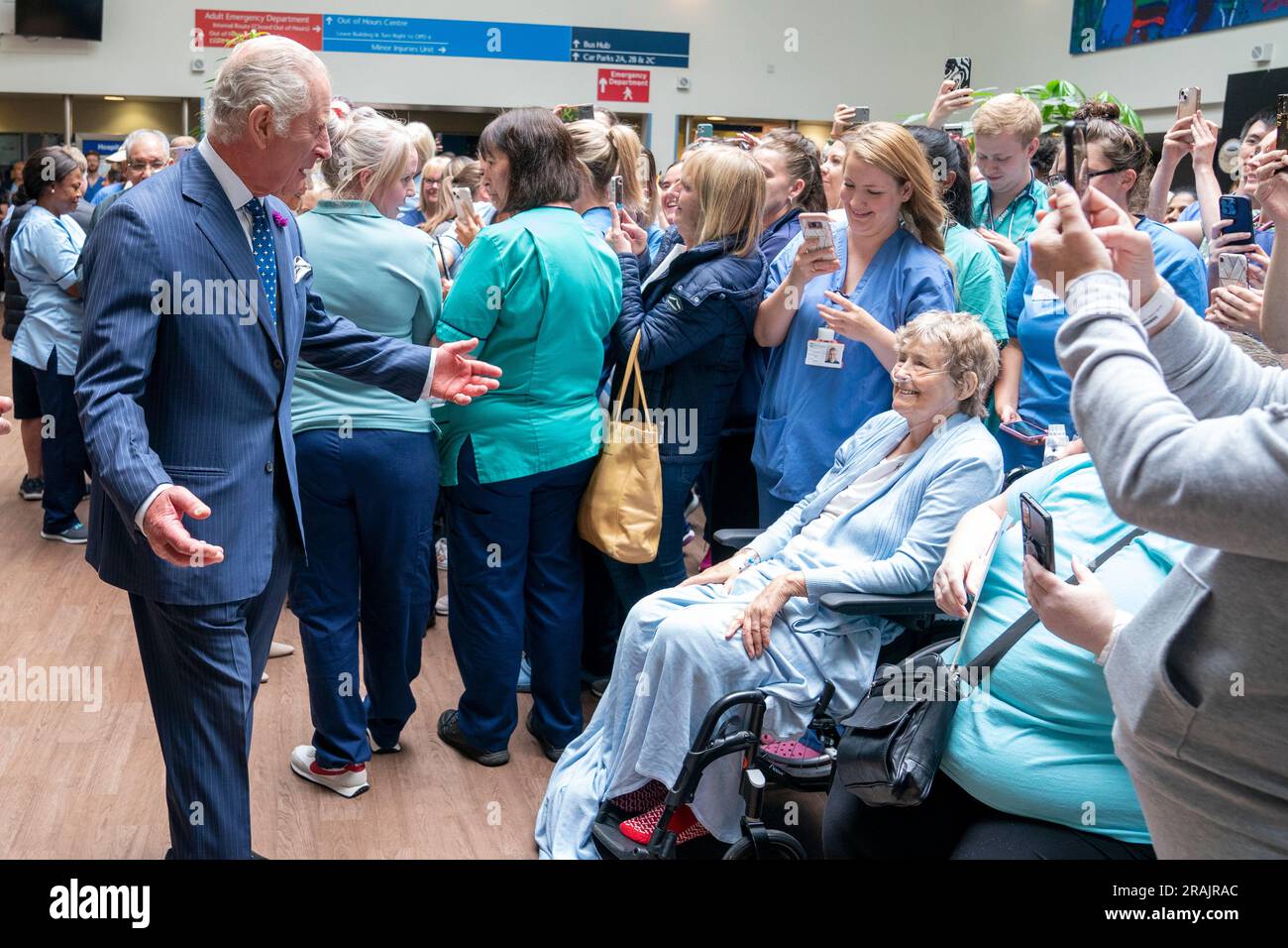 King Charles III meets staff and patients during a visit to the Royal ...