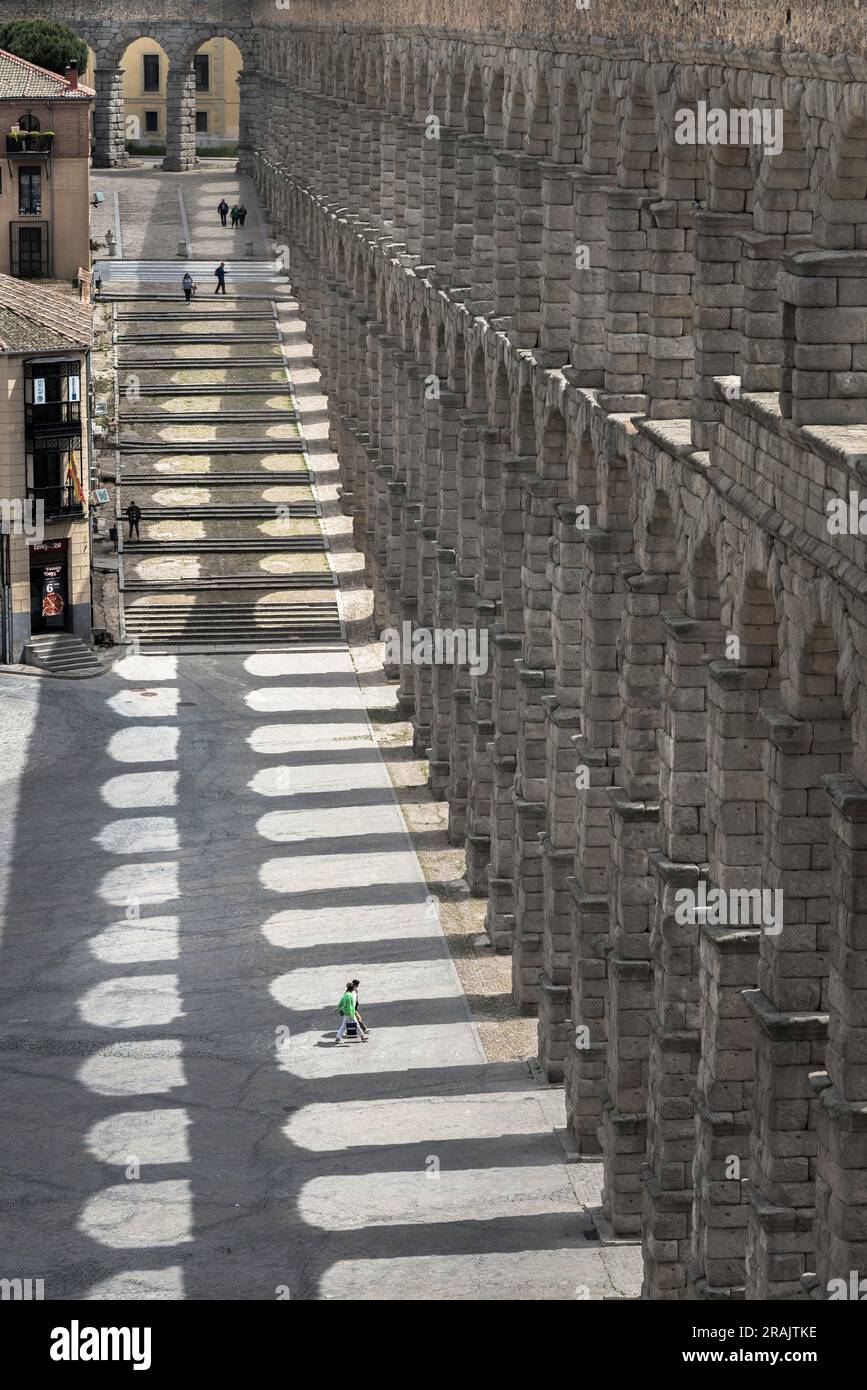 Spain travel, view in summer of shadows cast by the 30m arches of the ...